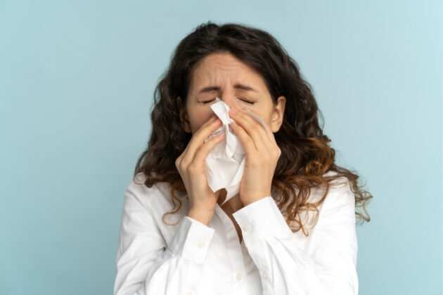 Can Holding in a Sneeze Damage Your Brain or Ears? What Doctors Say